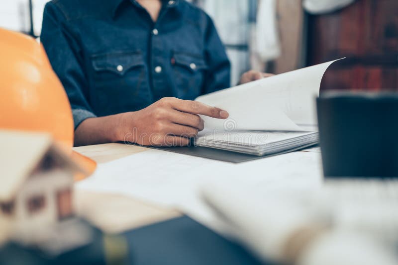 Architect Engineer Read Drawing Design Working on Blueprint. House ...