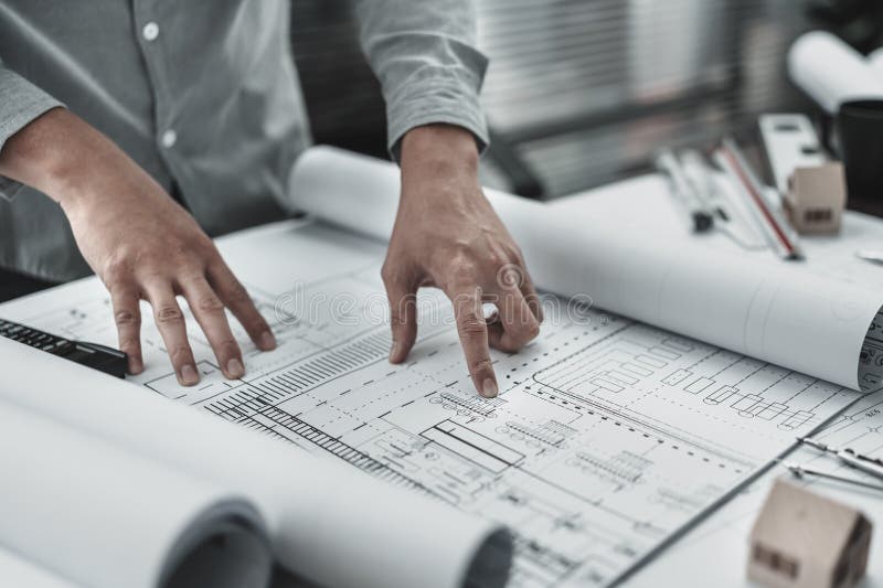 Architect Engineer Read Drawing Design Working on Blueprint. House ...