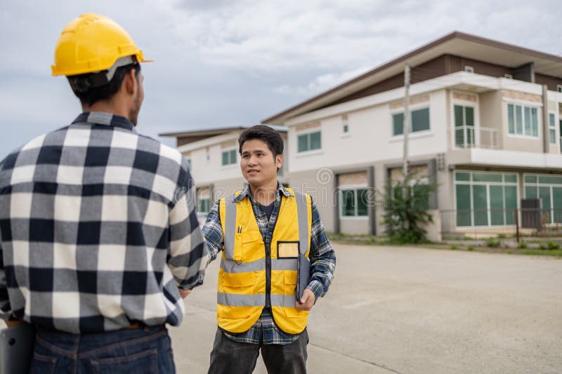 Architect and Engineer Shaking Hands at Job Site, the Project ...
