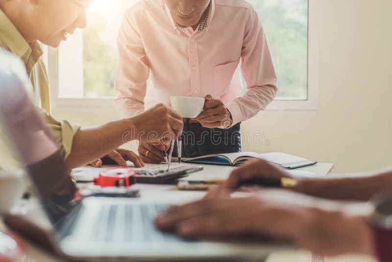 Architect or Engineer Team Working with Blueprints Building Plan Design ...