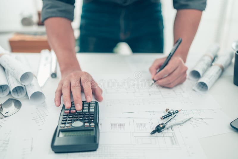Architect Engineer Use Calculator for Calculate Drawing Design Working ...