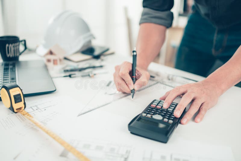 Architect Engineer Use Calculator for Calculate Drawing Design Working ...