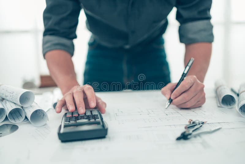 Architect Engineer Use Calculator for Calculate Drawing Design Working ...