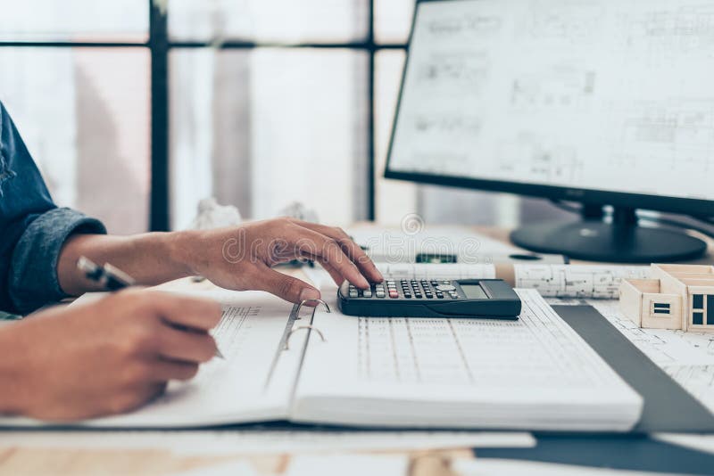 Architect Engineer Use Calculator for Calculate Drawing Design Working ...