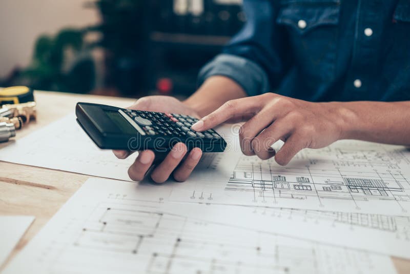 Architect Engineer Use Calculator for Calculate Drawing Design Working ...