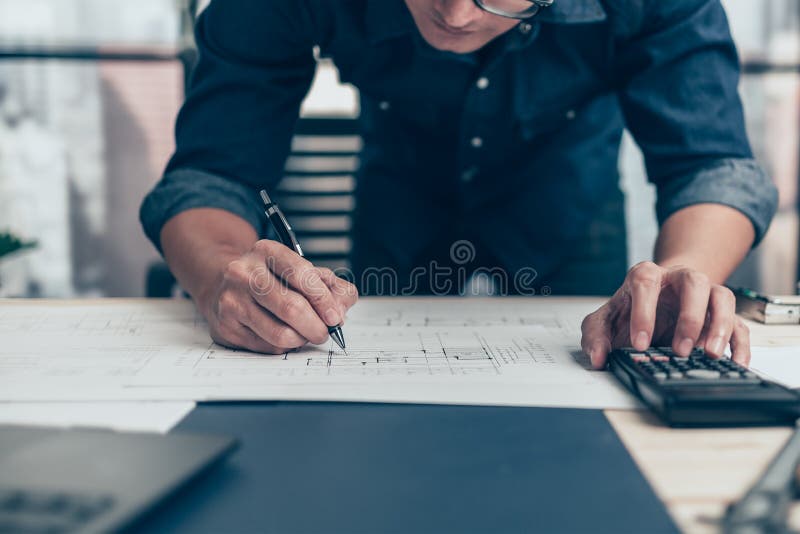 Architect Engineer Use Calculator for Calculate Drawing Design Working ...