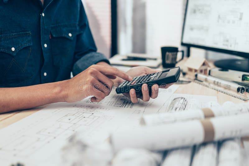Architect Engineer Use Calculator for Calculate Drawing Design Working ...