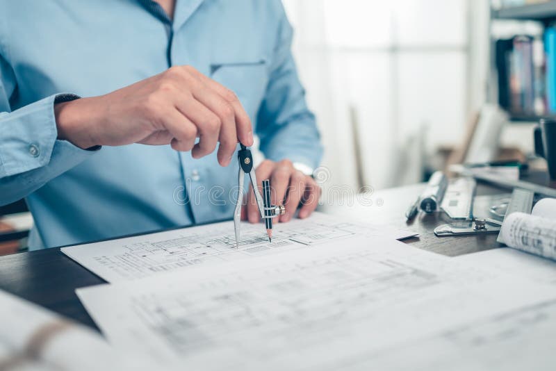 Architect Engineer Use Compass Drawing Design Working on Blueprint ...