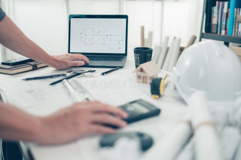 Architect Engineer Use Laptop for Check Drawing Design. House Planning ...