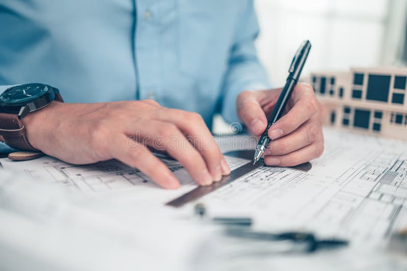 Architect Engineer Use Pen and Angle Protector Drawing Design Working on Blueprint. House ...