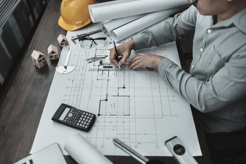 Architect Engineer Use Pen and Mini T-slide Drawing Design Working on ...