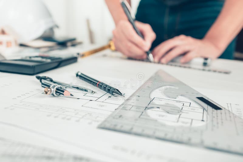 Architect Engineer Use Pen, Triangular Angle Ruler and Compass on ...