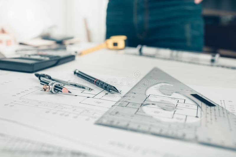 Architect Engineer Use Pen, Triangular Angle Ruler and Compass on ...