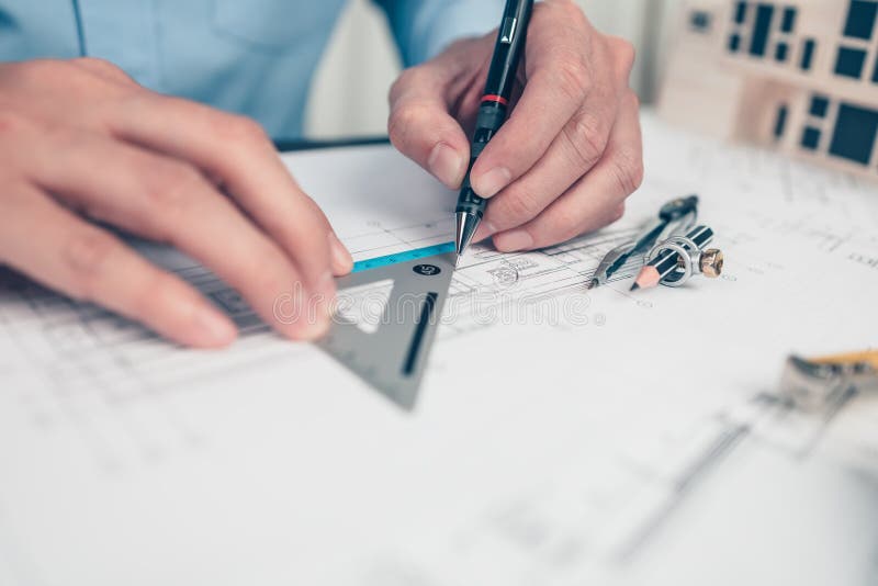 Architect Engineer Use Pencil and Triangular Angle Ruler Drawing Design ...