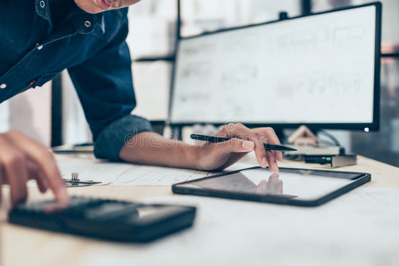 Architect Engineer Use Tablet To Read Drawing Design. House Planning ...