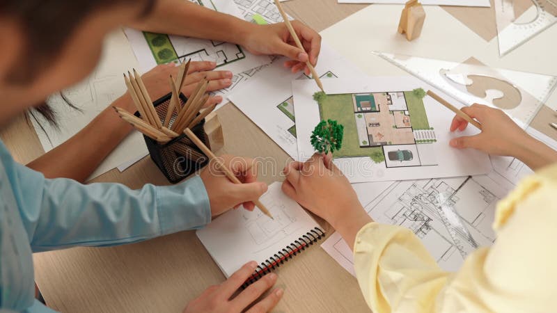 Architects Discussing about House Construction Design. Closeup ...