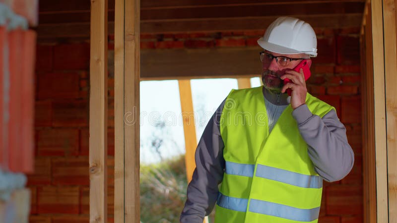 Architect Engineer Using Mobile Cell Phone Communications Control ...