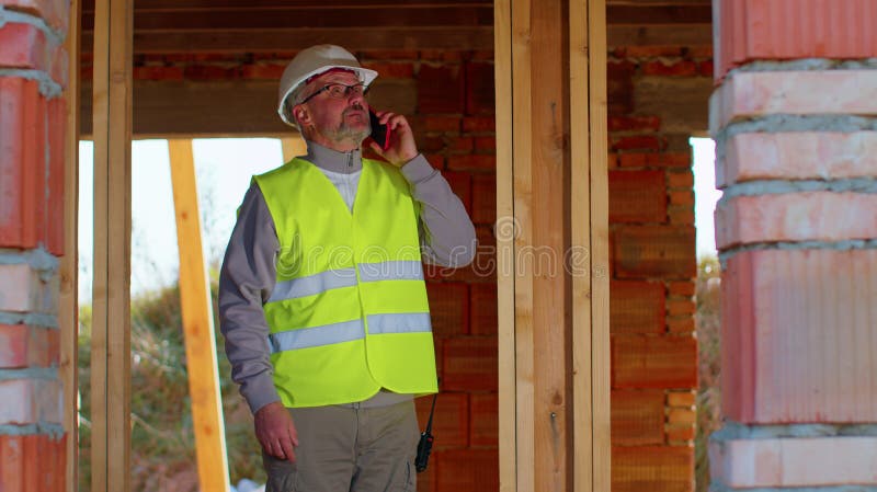 Architect Engineer Using Mobile Cell Phone Communications Control ...