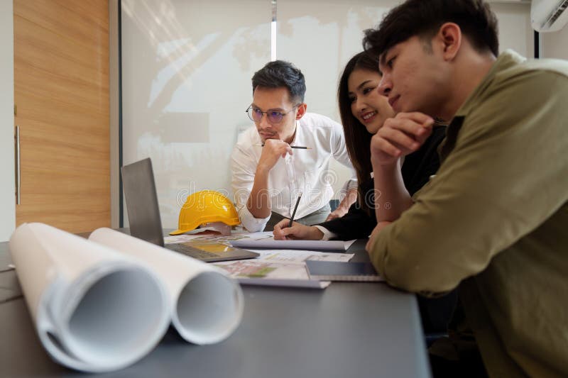 Architect and Engineer Working with Blueprints for Architectural Plan ...