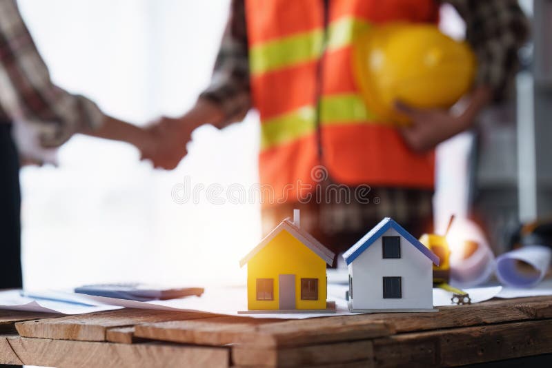 Architect and Engineer Working with Blueprints for Architectural Plan ...