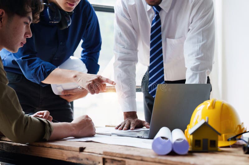 Architect and Engineer Working with Blueprints for Architectural Plan ...