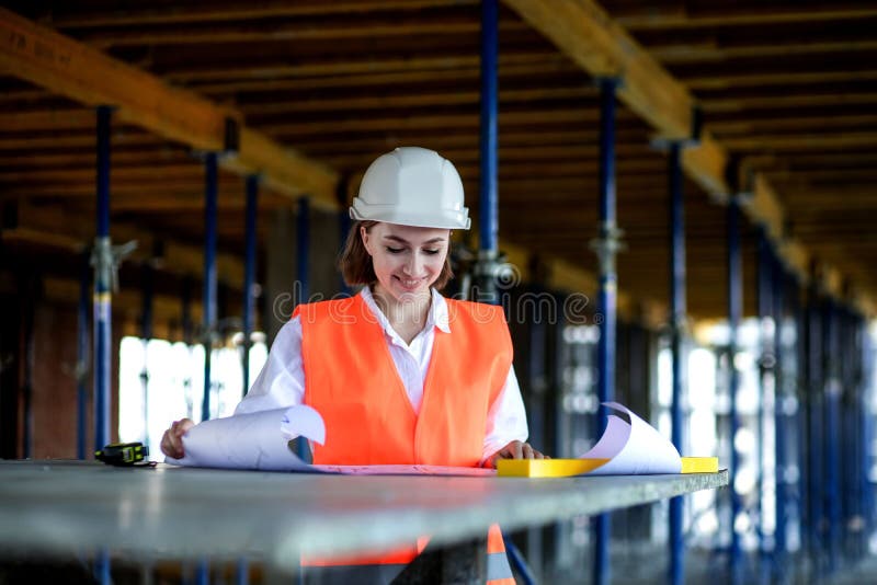 Architect or Engineer Working, Browsing Building Project Indoor of ...