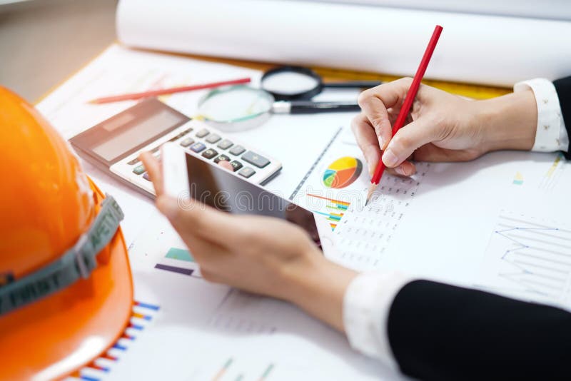 Architect or Engineer Working Project Accounting with Graph. Stock ...