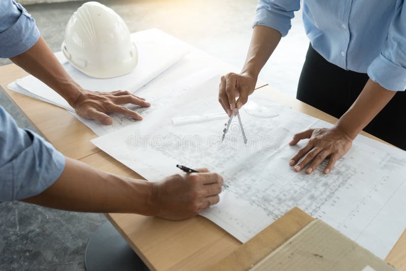 Architect or Engineer Working on Table Show Work Stock Photo - Image of ...