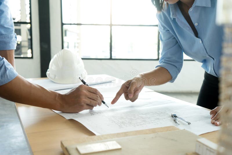 Architect or Engineer Working on Table Show Work Stock Photo - Image of ...