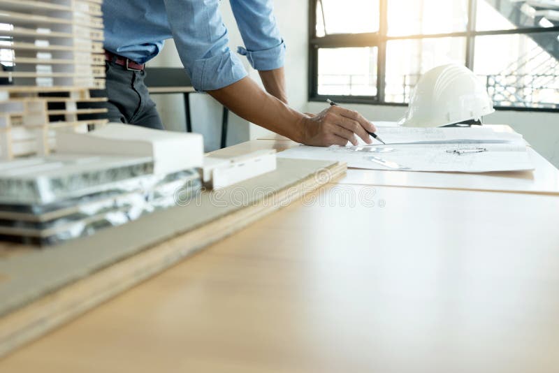 Architect or Engineer Working on Table Show Work Stock Image - Image of ...