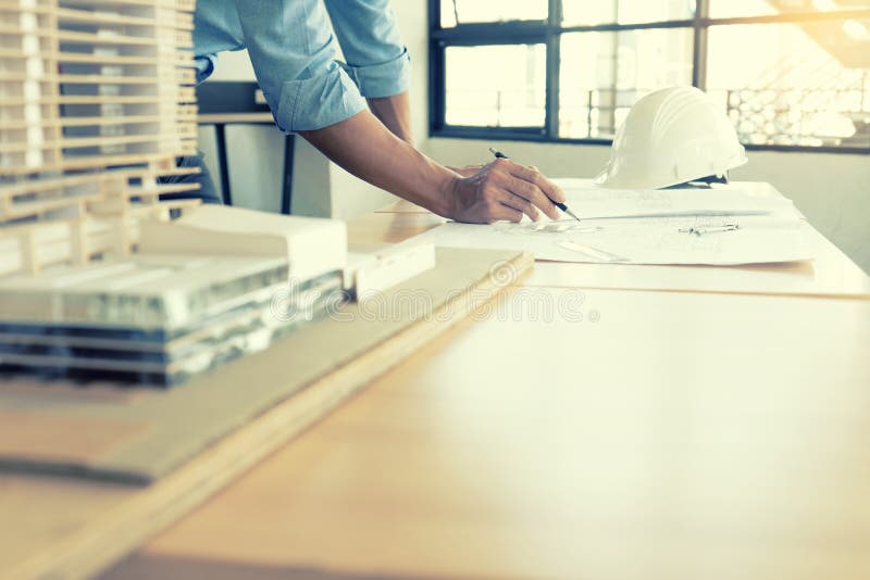 Architect or Engineer Working on Table Show Work Stock Image - Image of ...