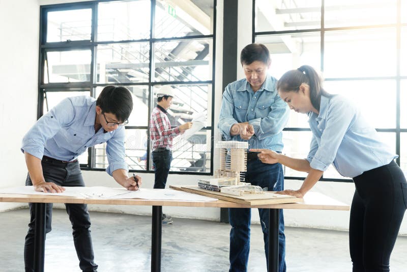 Architect or Engineer Working on Table Show Work Stock Image - Image of ...