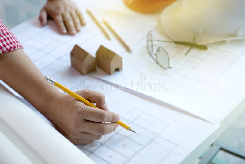 Architect or Engineer Working on Table Stock Photo - Image of blueprint ...