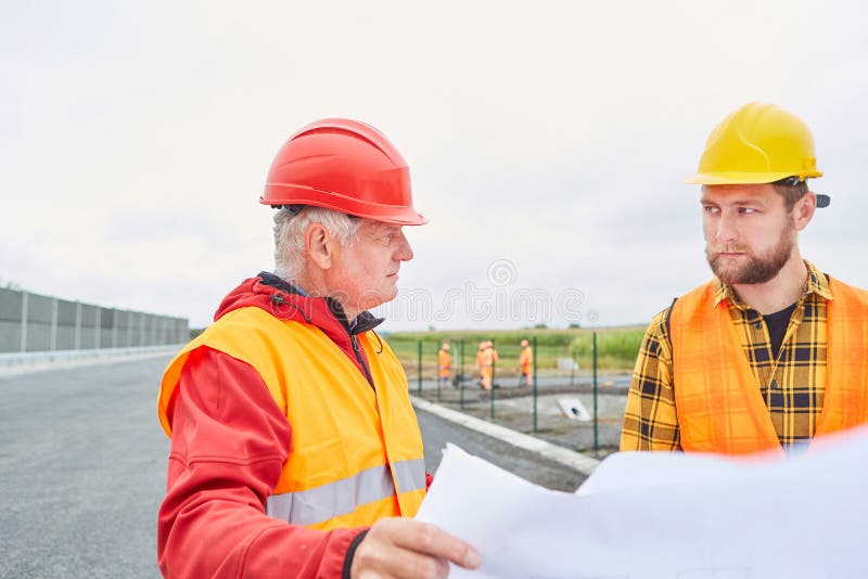 Architect and Foreman with Blueprint for House Construction Stock Photo ...