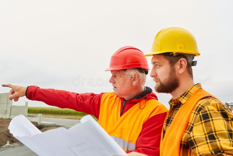 Architect and Foreman with Building Drawing Stock Photo - Image of ...