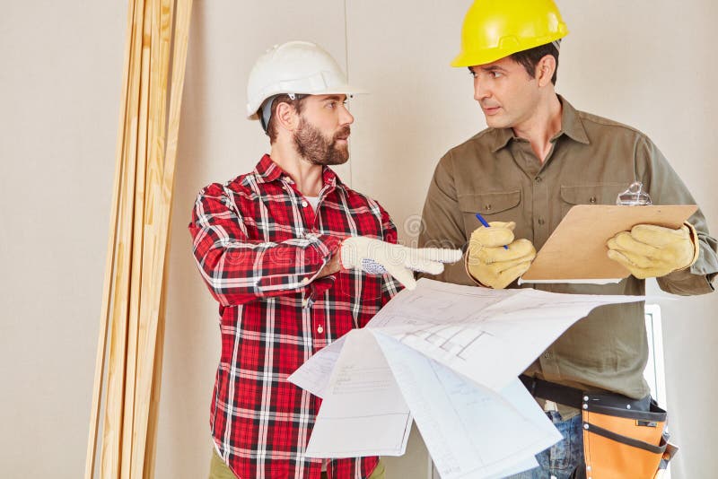 Architect and Foreman with Construction Drawing during Planning Stock ...