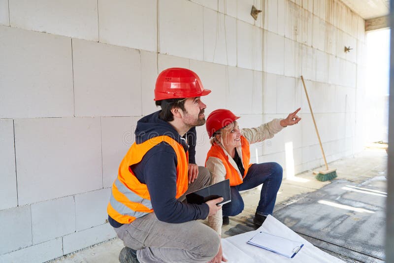 Architect and Foreman during Construction Planning Stock Photo - Image ...