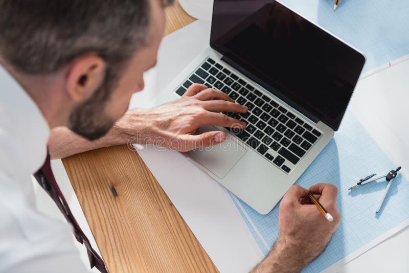 Architect in Formal Wear Working with Laptop at Modern Office Stock ... Architect in Formal Wear Working with Laptop at Modern Office Stock ...