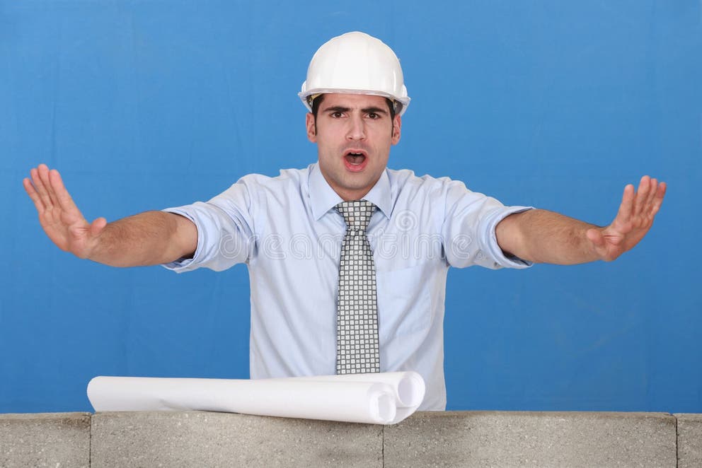Architect gesturing stop stock image. Image of helmet - 28010029