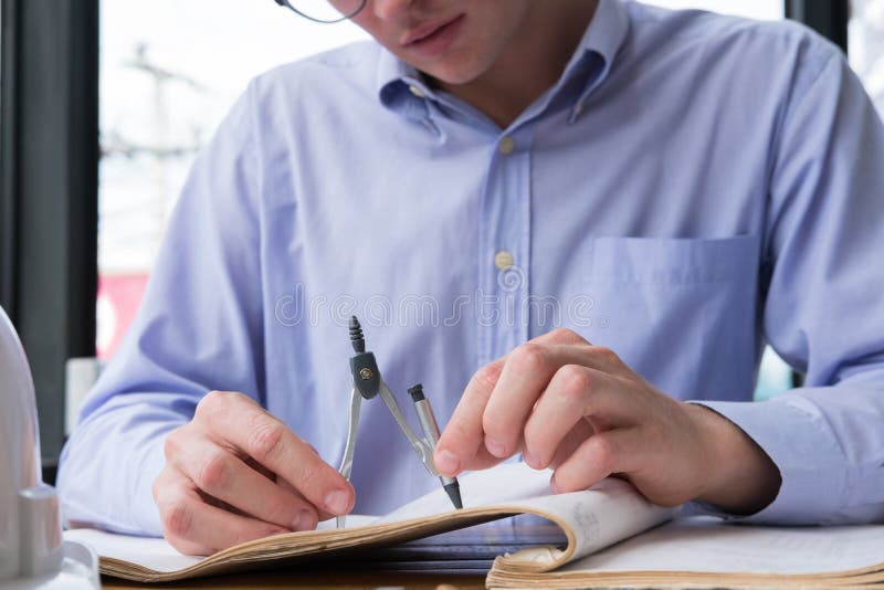 Architect Hand Holding Drawing Compass Working on Construction P Stock ...