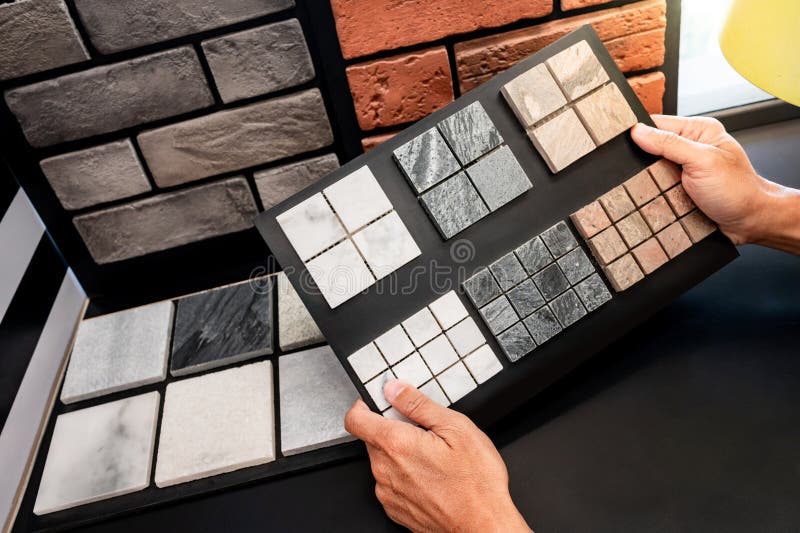 Architect Hand Holding Stone Tile Collection Display on Sample Board ...