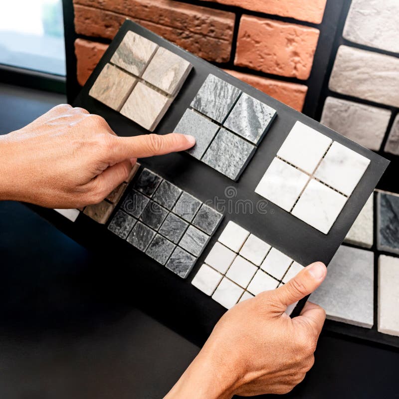 Architect Hand Pointing at Stone Tile Collection Display on Sample ...