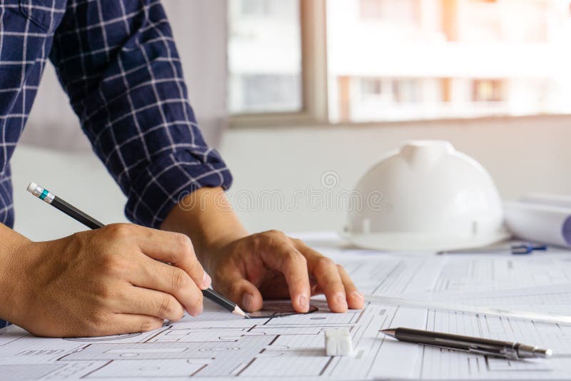 Architect Hand Sketching a Construction Project Stock Photo - Image of ...