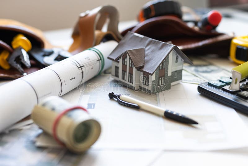 An Architect Has Designed Blueprints for a New House Project. Stock ...