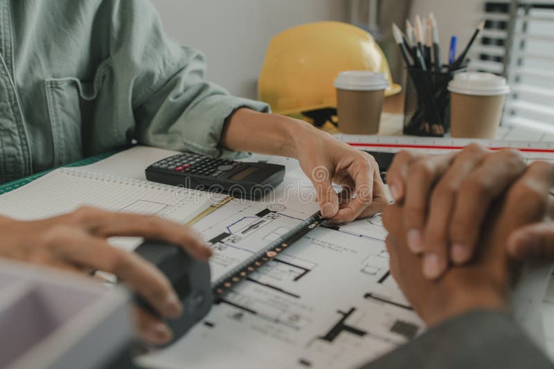 An Architect and His Assistant are Brainstorming and Examining the ...