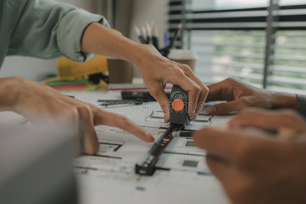 An Architect and His Assistant are Brainstorming and Examining the ...