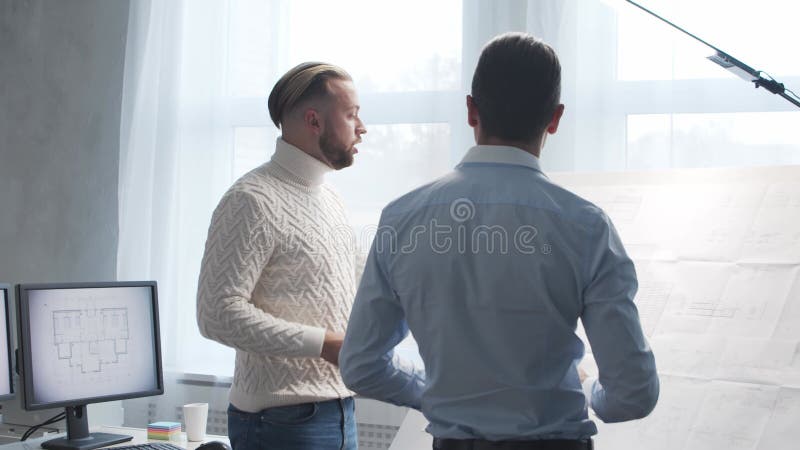 Architect and His Colleague Work in Loft Using Drawing Board and ...