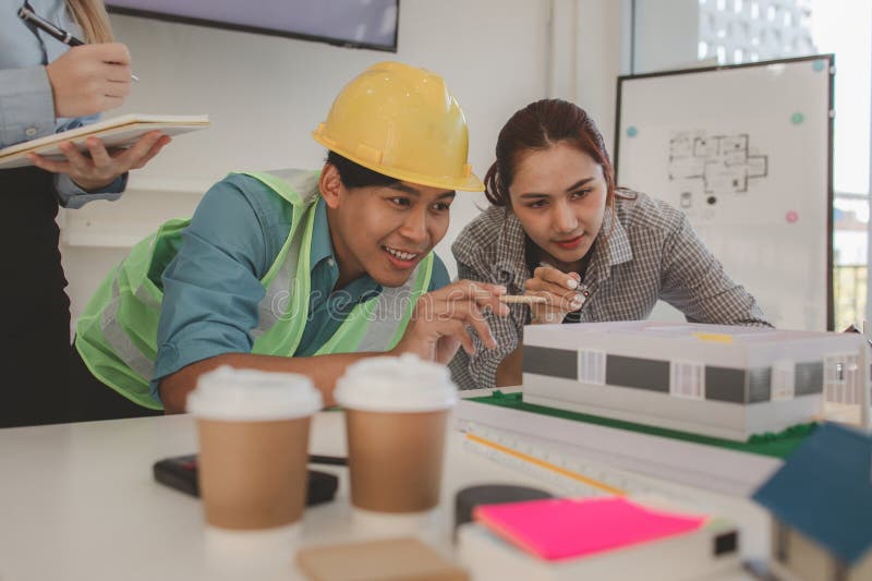 The Architect and His Team are Meeting with the Construction Supervisor ...