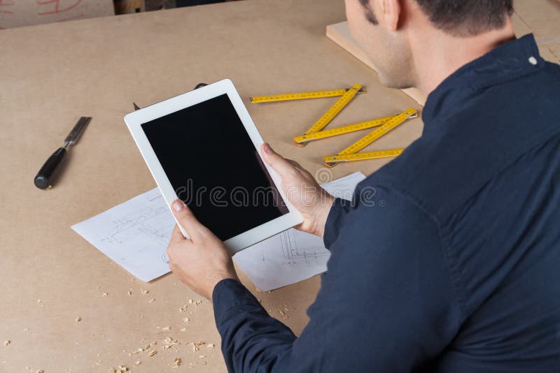 Architect Holding Digital Tablet in Workshop Stock Photo - Image of ...