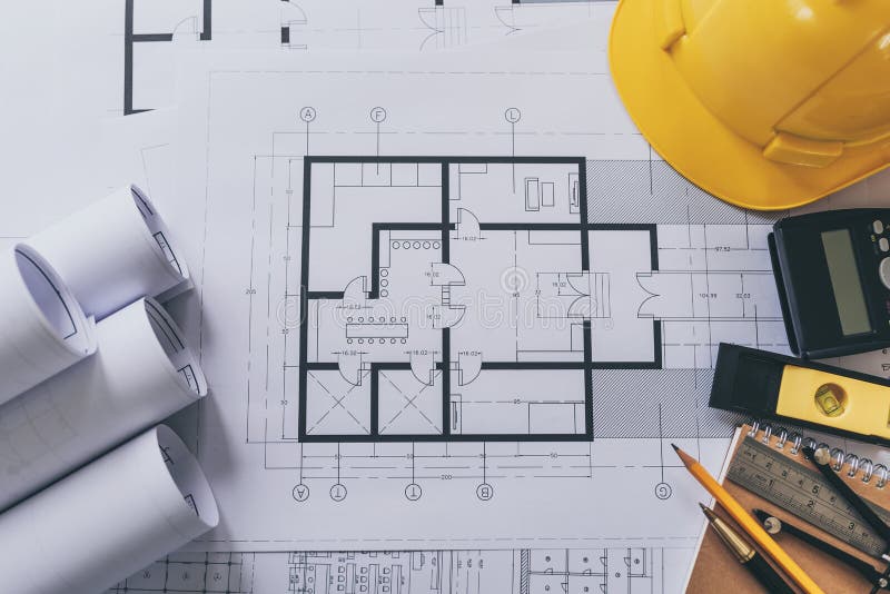 Architect House Plan Roled -up Plans on the Table, High Angle View ...